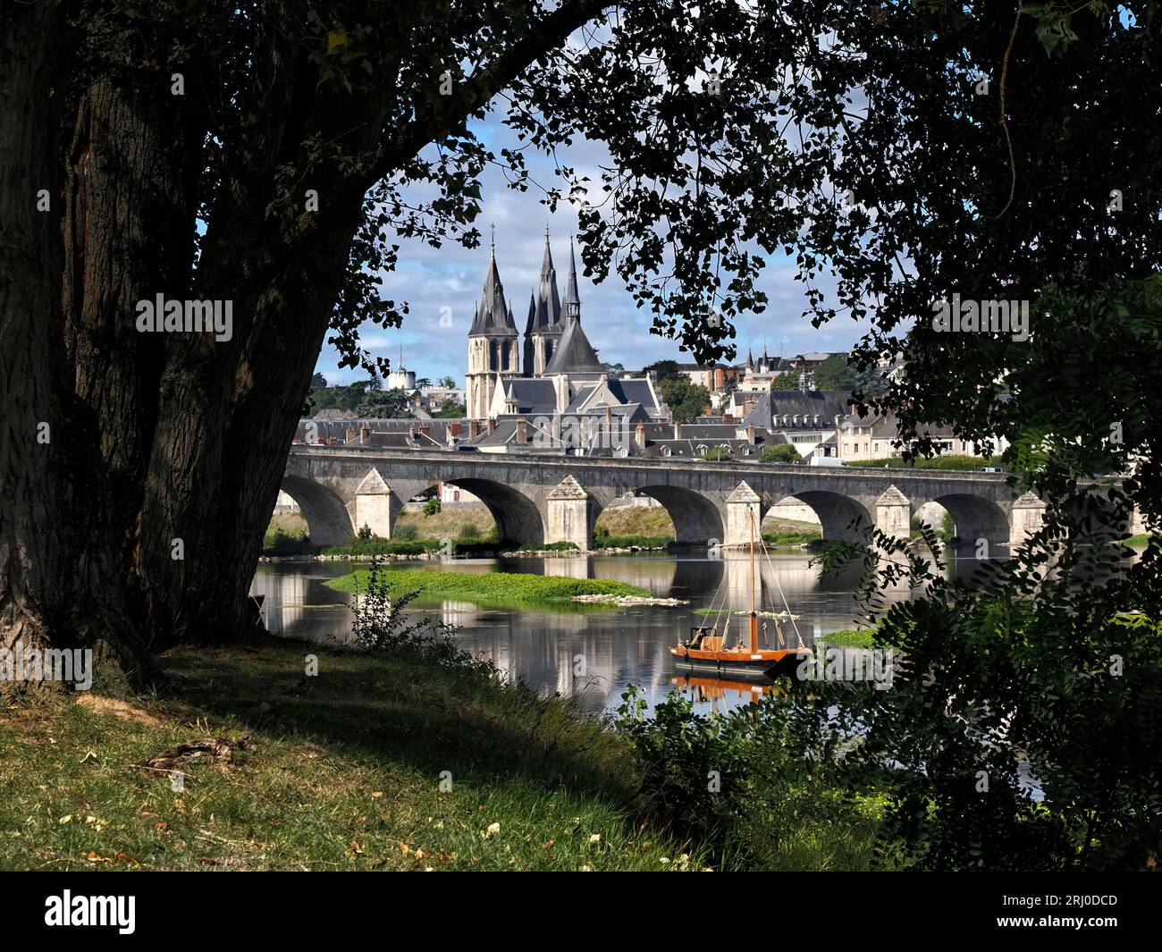 Bridge Jacques-Gabriel over the Loire river and Saint Nicholas church ...