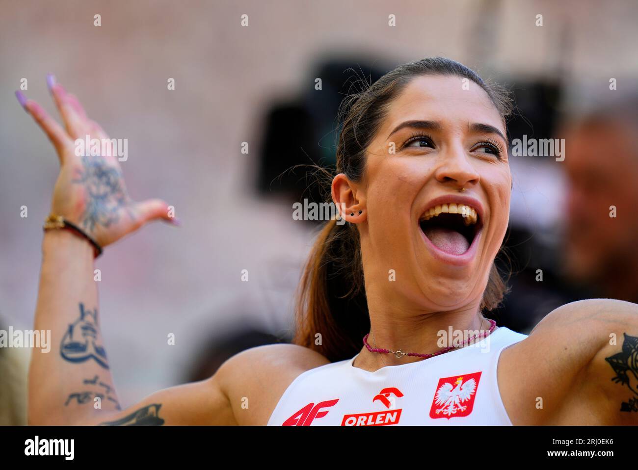 Ewa Swoboda, of Poland reacts after finishing a women's 100-meters heat ...