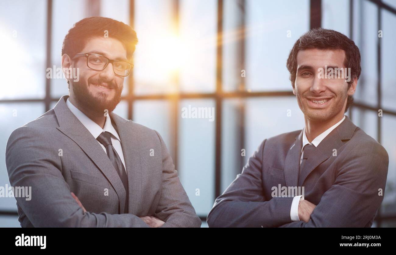 Confident business team arms hi-res stock photography and images - Alamy
