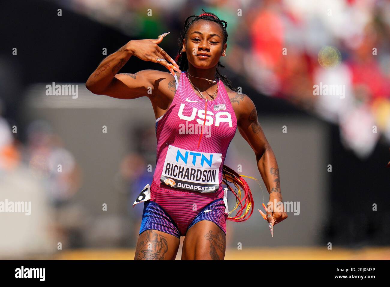 Sha'Carri Richardson, of the United States competes in a women's 100 ...