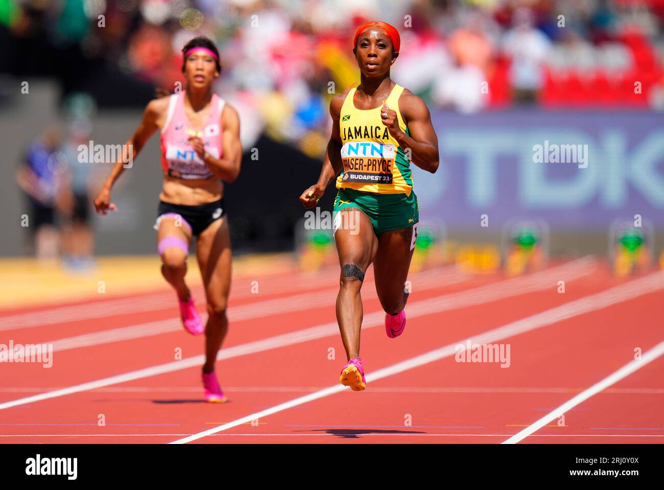 Shelly-Ann Fraser-Pryce, of Jamaica races in a women's 100-meters heat ...