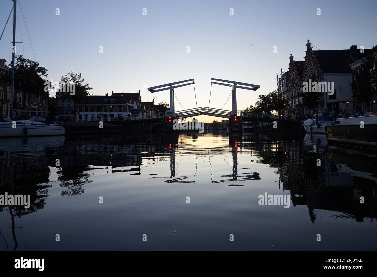 Historic bridge across the river Spaarne in the city centre of Haarlem ...