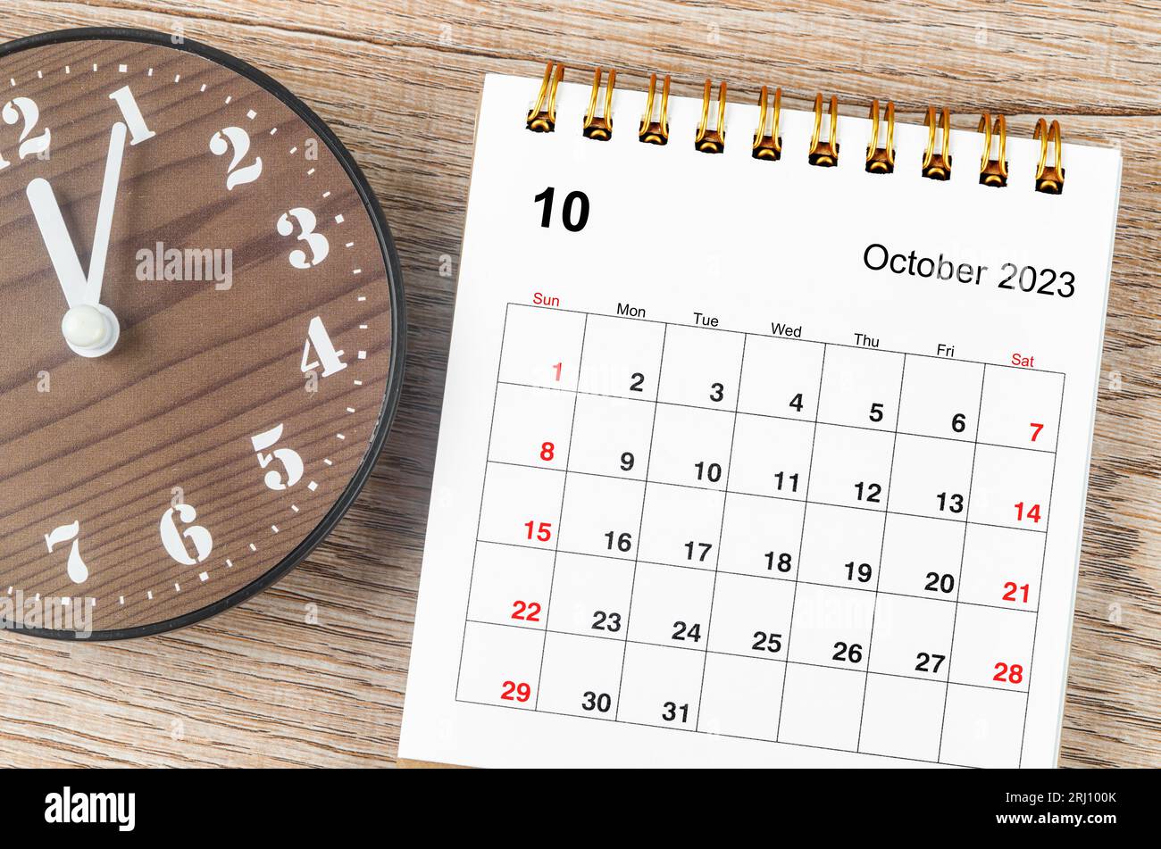 October 2023 Monthly desk calendar for 2023 year with clock Stock Photo ...