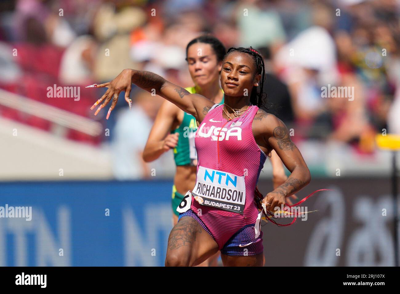Sha'Carri Richardson, of the United States, reacts in the Women's 100 ...