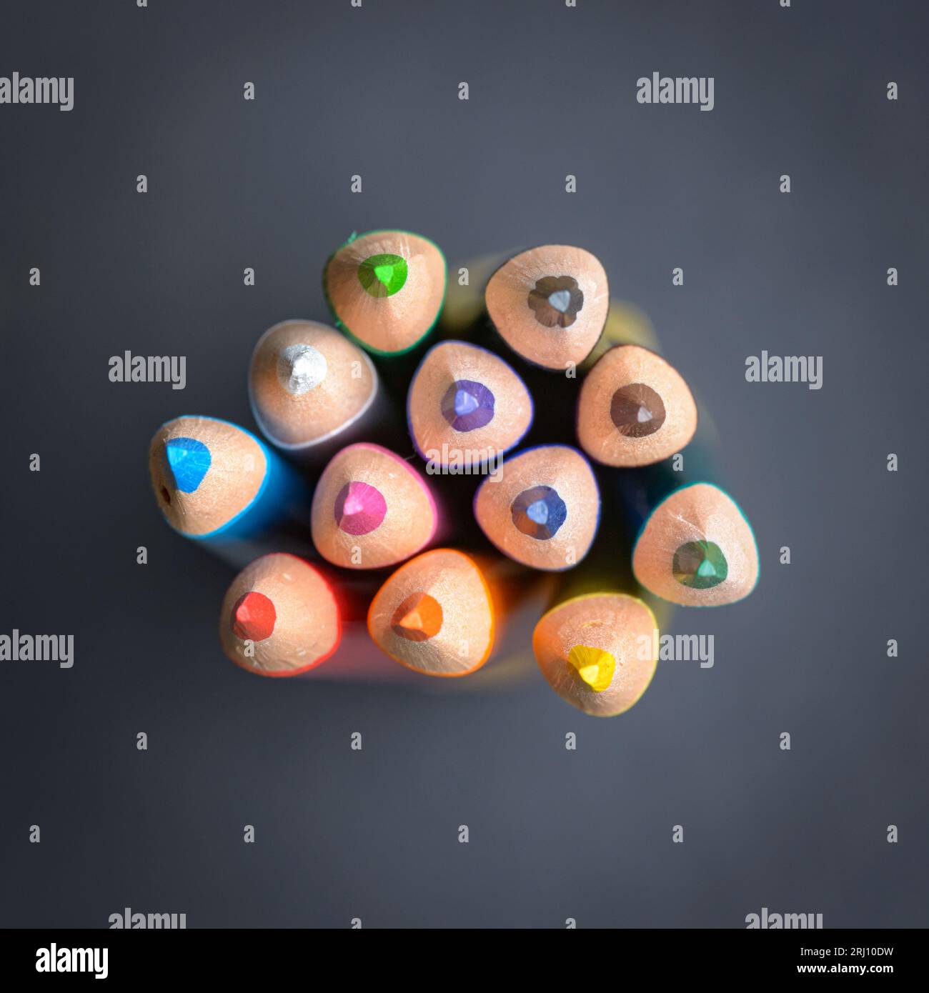 Top view of collection set of colored pencils crayons orderly aligned ...