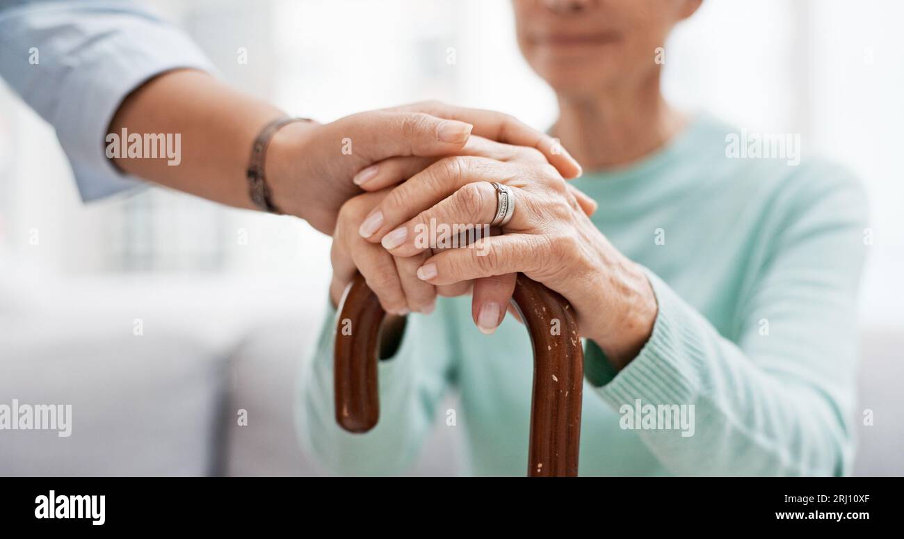 Senior woman, walking cane and holding hands of nurse with healthcare ...