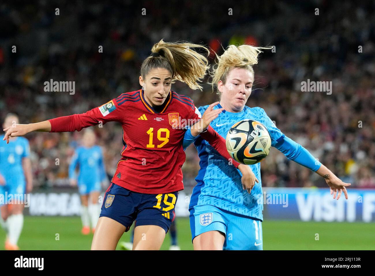 Spain's Olga Carmona vies for the ball with England's Lauren Hemp ...