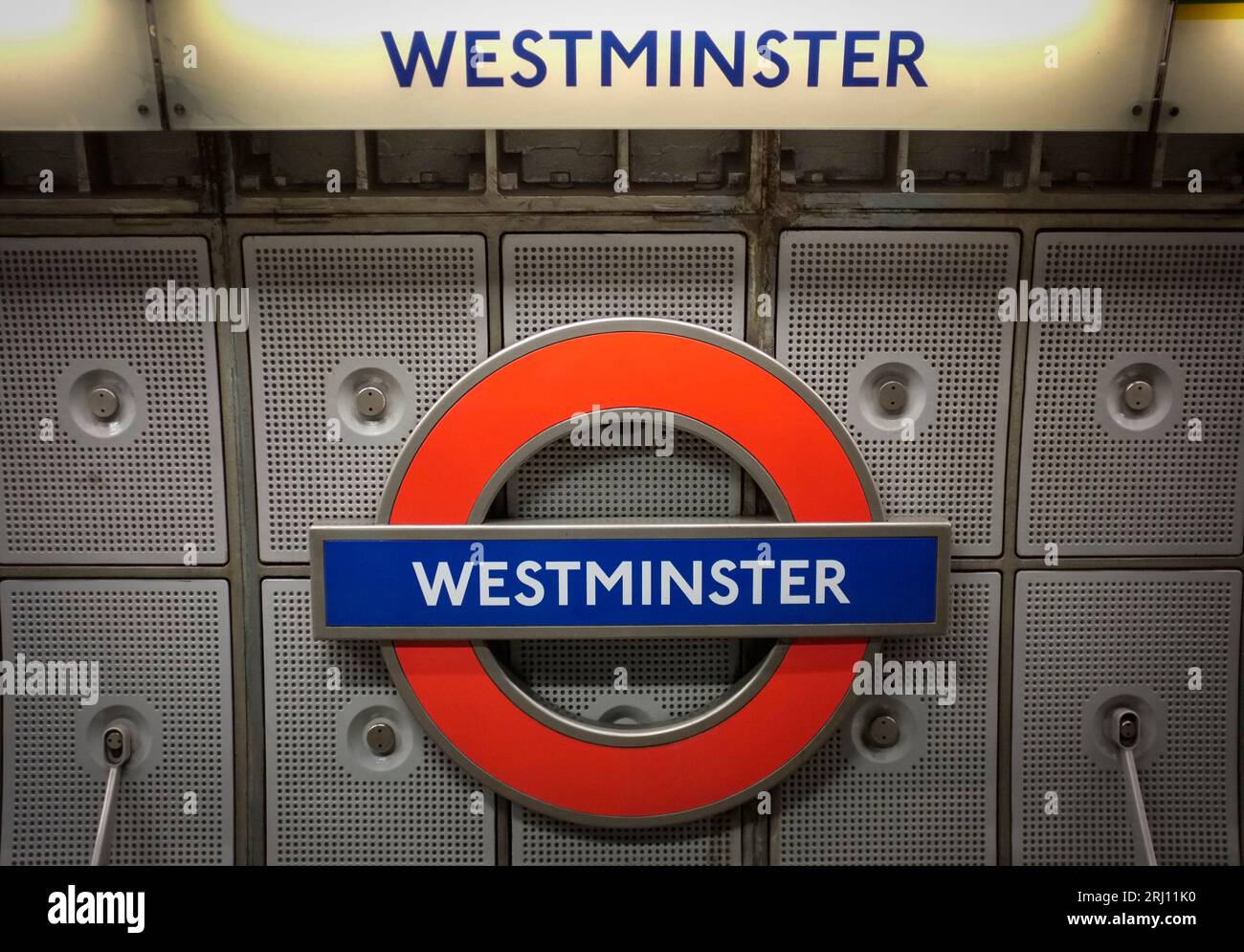Westminster tube station sign at the platform Stock Photo - Alamy