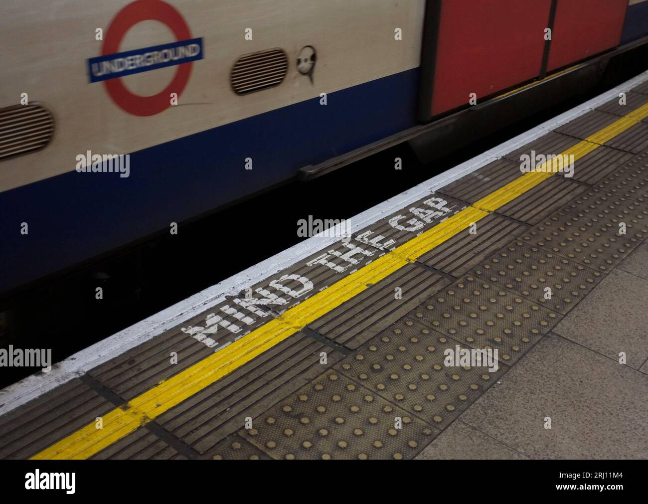 Mind the gap signs on the platforms at London Underground stations ...