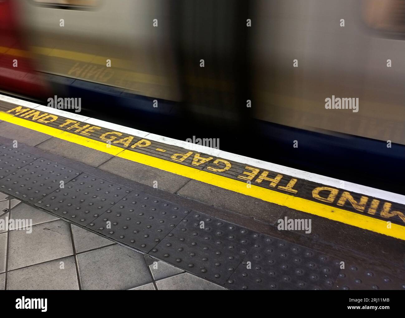 Mind the gap signs on the platforms at London Underground stations ...