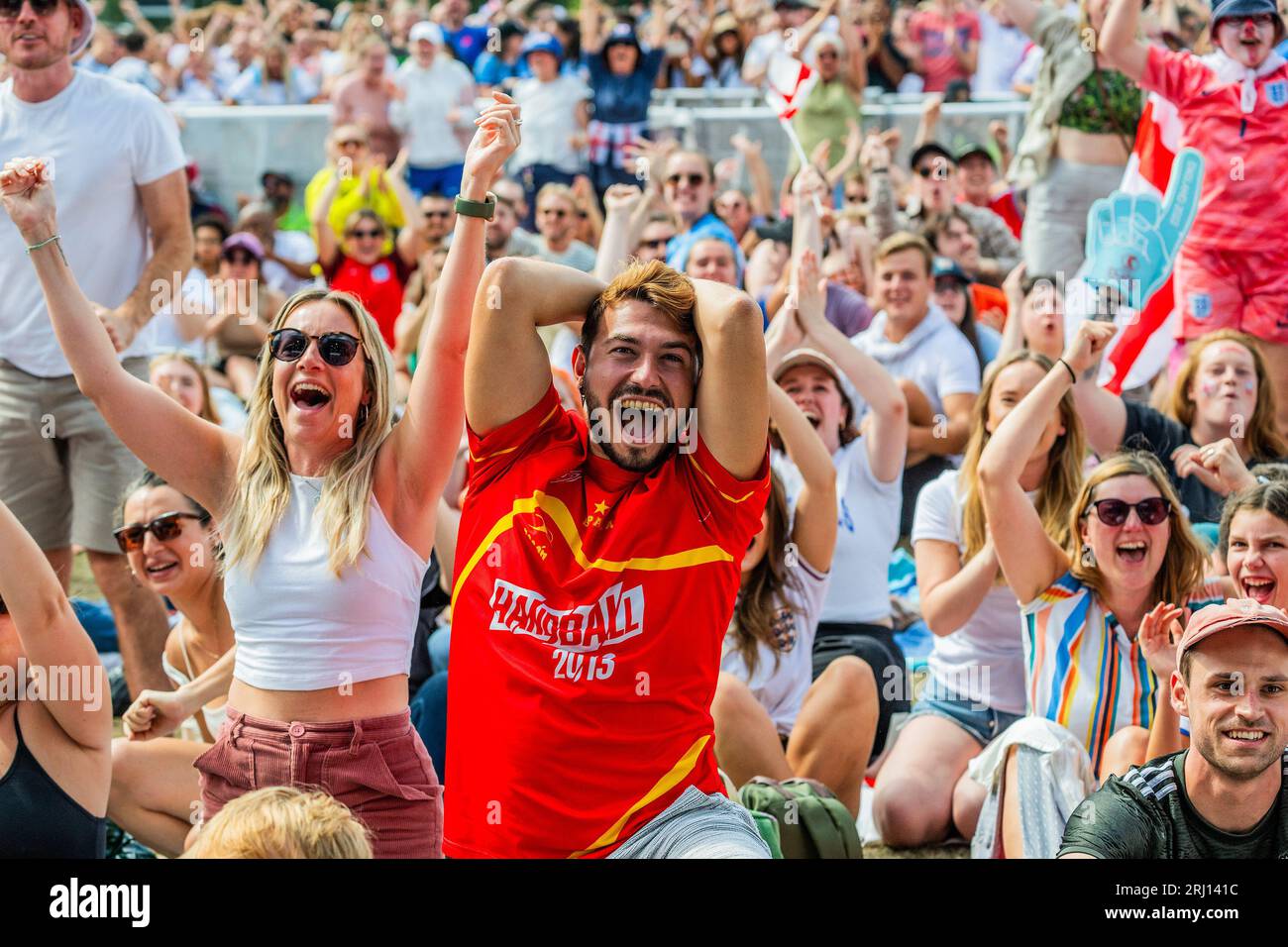 While watching the big screen at fan park hi-res stock photography and ...