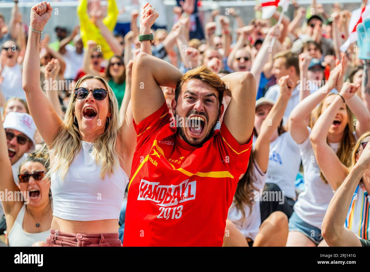 While watching the big screen at fan park hi-res stock photography and ...