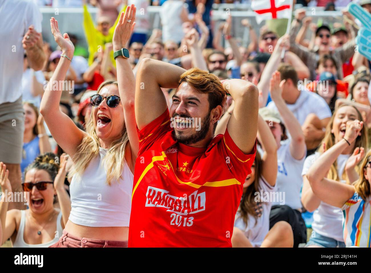 While watching the big screen at fan park hi-res stock photography and ...