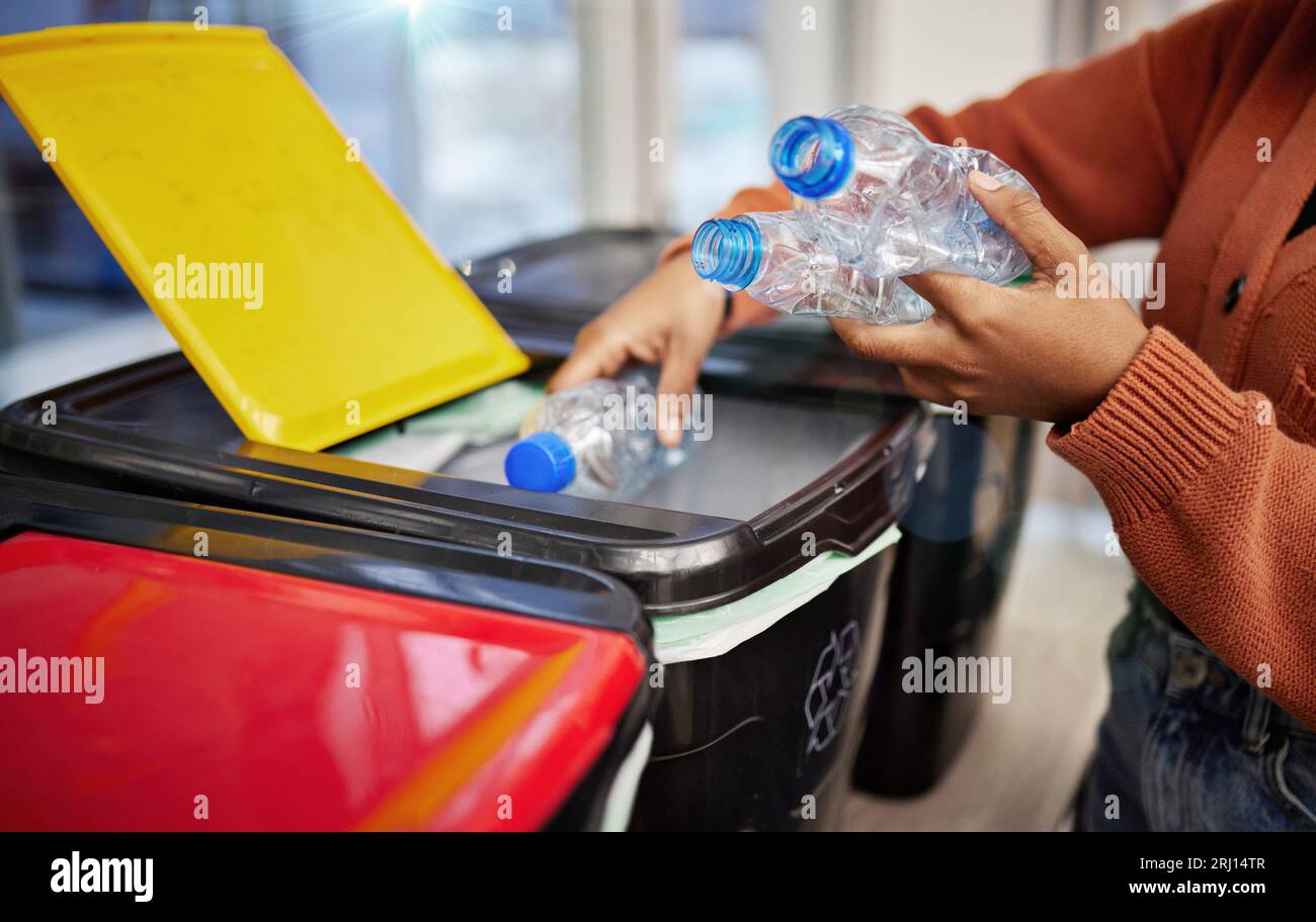 Plastic, recycle and hands of person with bottle in bin for eco ...