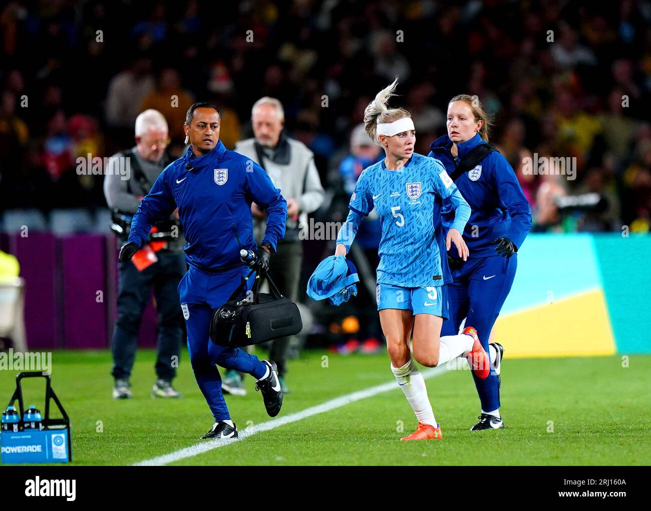England's Alex Greenwood goes to the bench to change her shorts after receiving medical ...