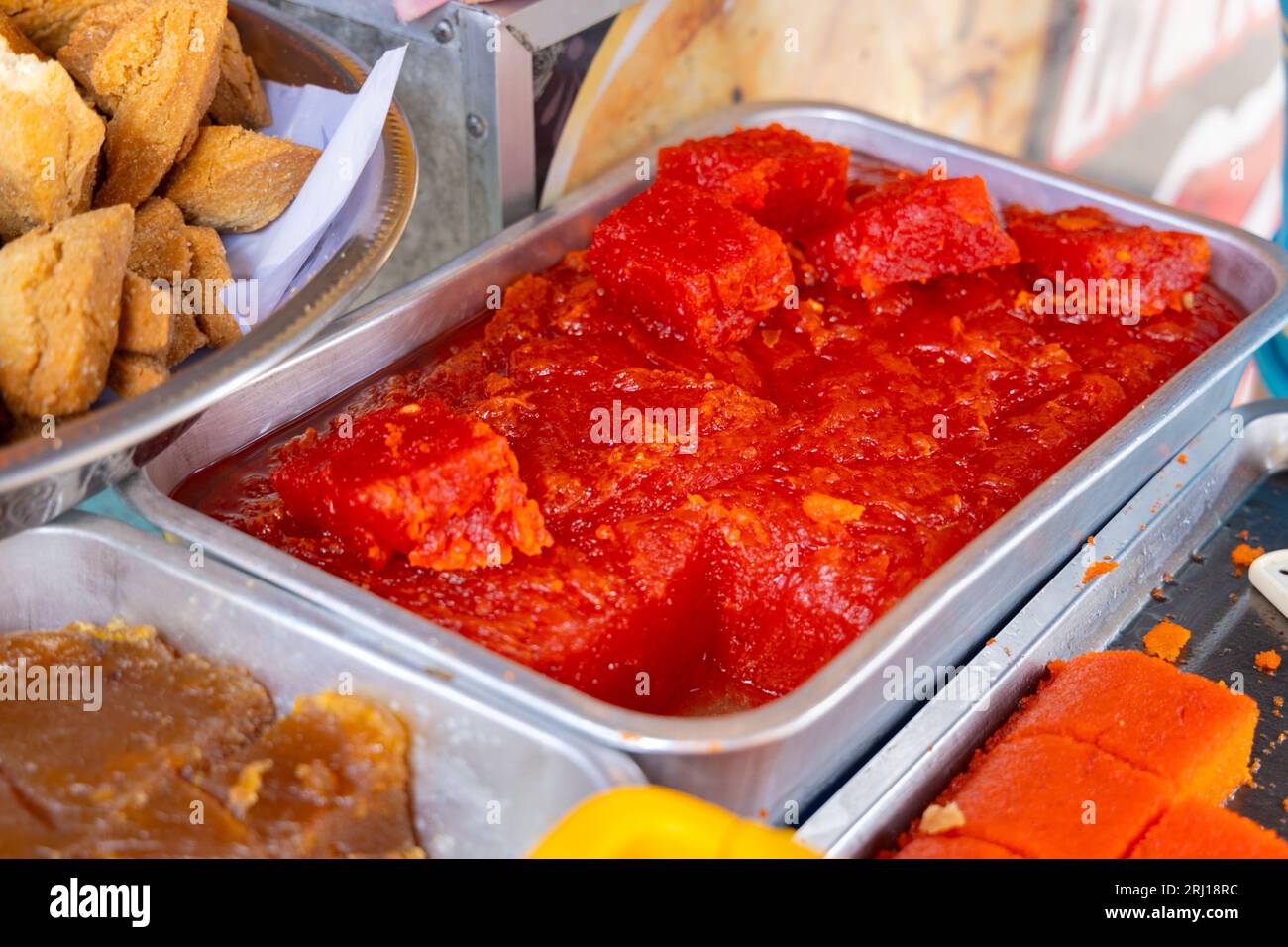 Delicious jelly snacks at a street food stall in Asia Stock Photo - Alamy