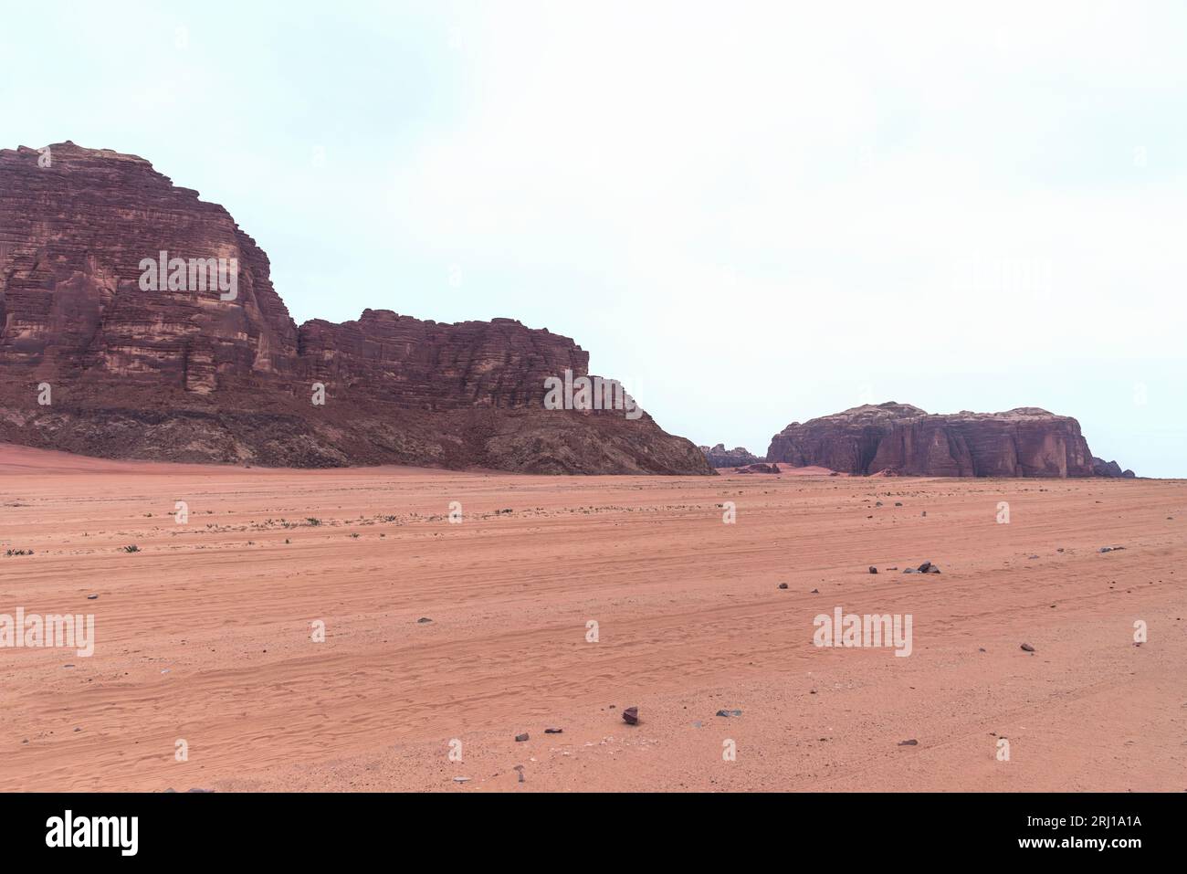 A beautiful day in the Jordanian desert of Wadi Rum. wide dessert with ...