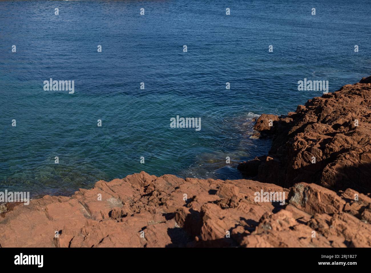 French Riviera coast with red rocks in Saint Raphael, travel content ...