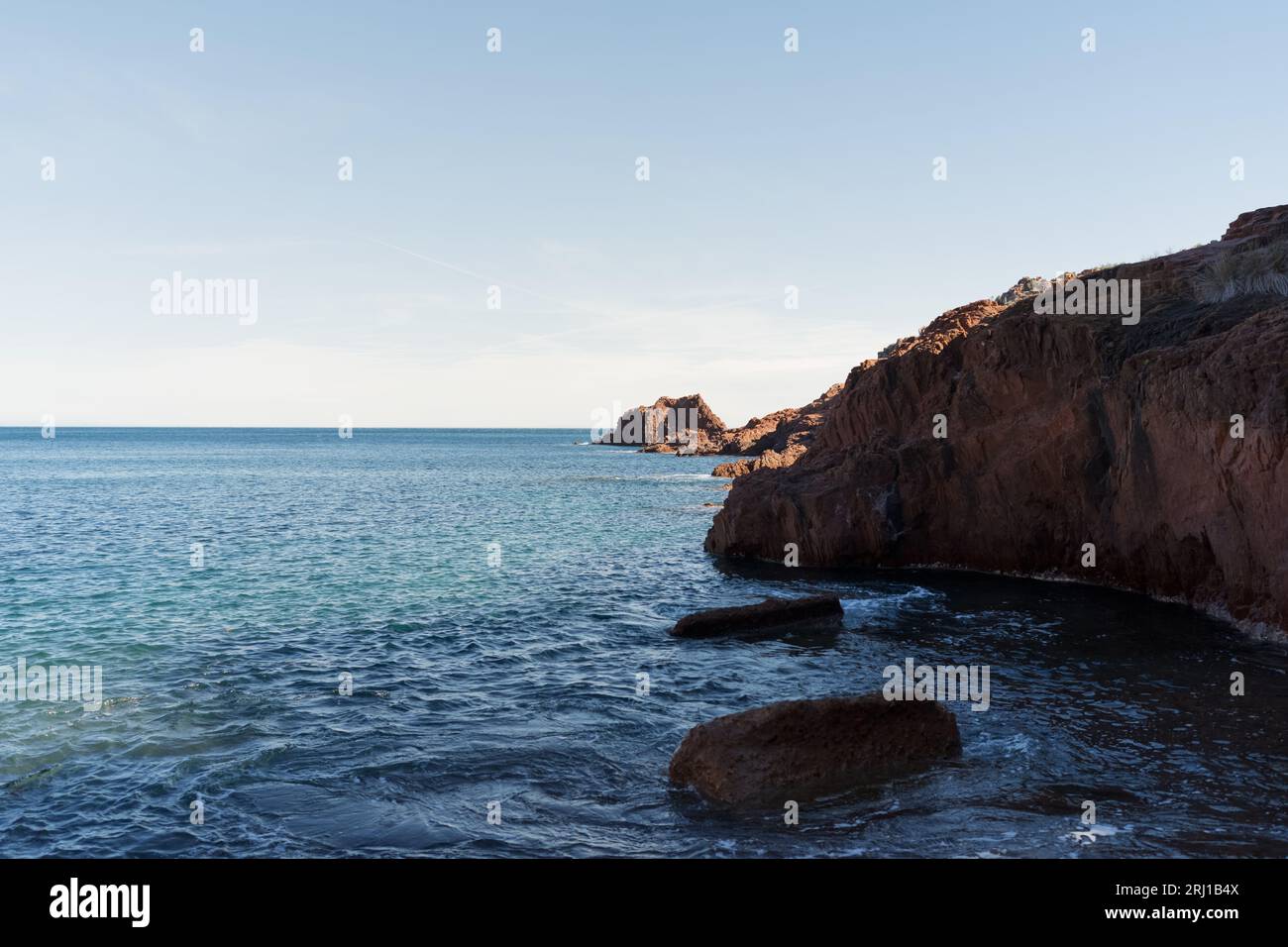 French Riviera coast with red rocks in Saint Raphael, travel content ...