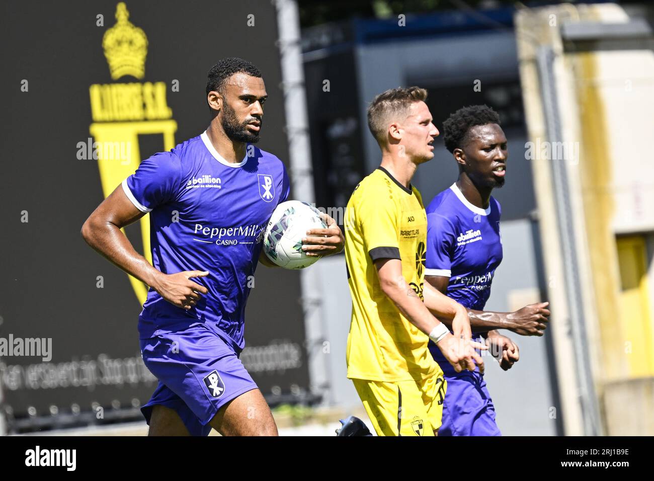 Patro Eisden's Elisha Sam takes the ball after scoring a penalty during ...