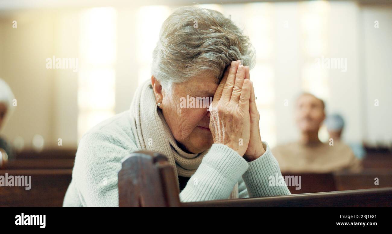 Praying old woman hi-res stock photography and images - Alamy