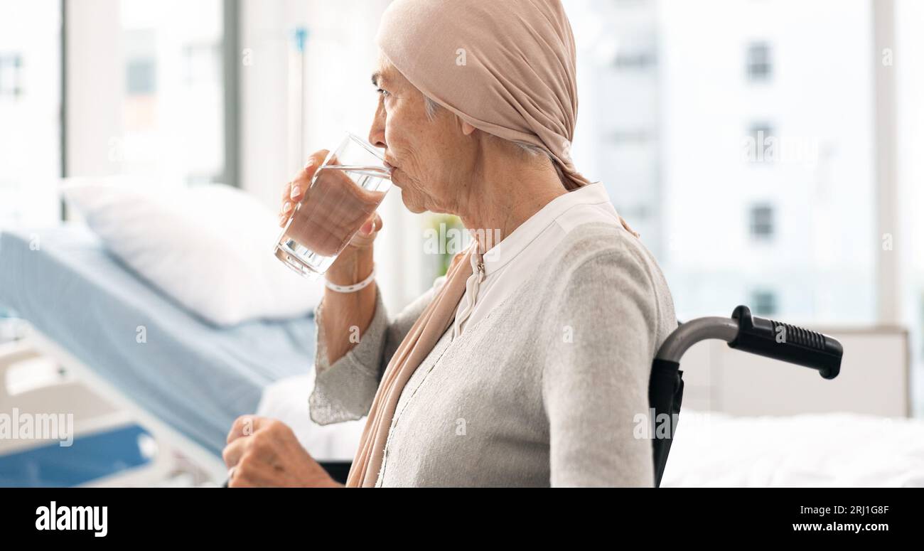 Cancer, Parkinson and elderly woman at hospital in wheelchair with ...