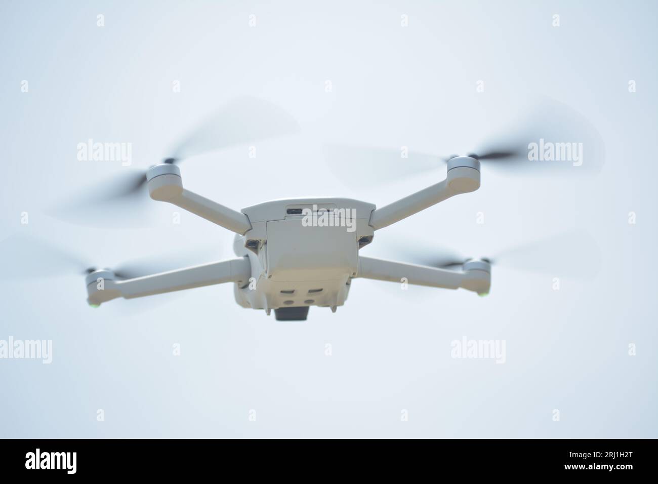 Flying Drone with sky background Stock Photo - Alamy