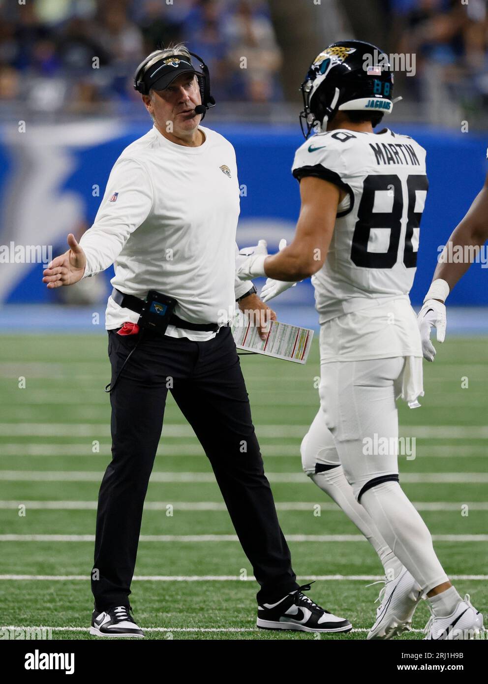 Jacksonville Jaguars head coach Doug Pederson gives a high-five to wide ...