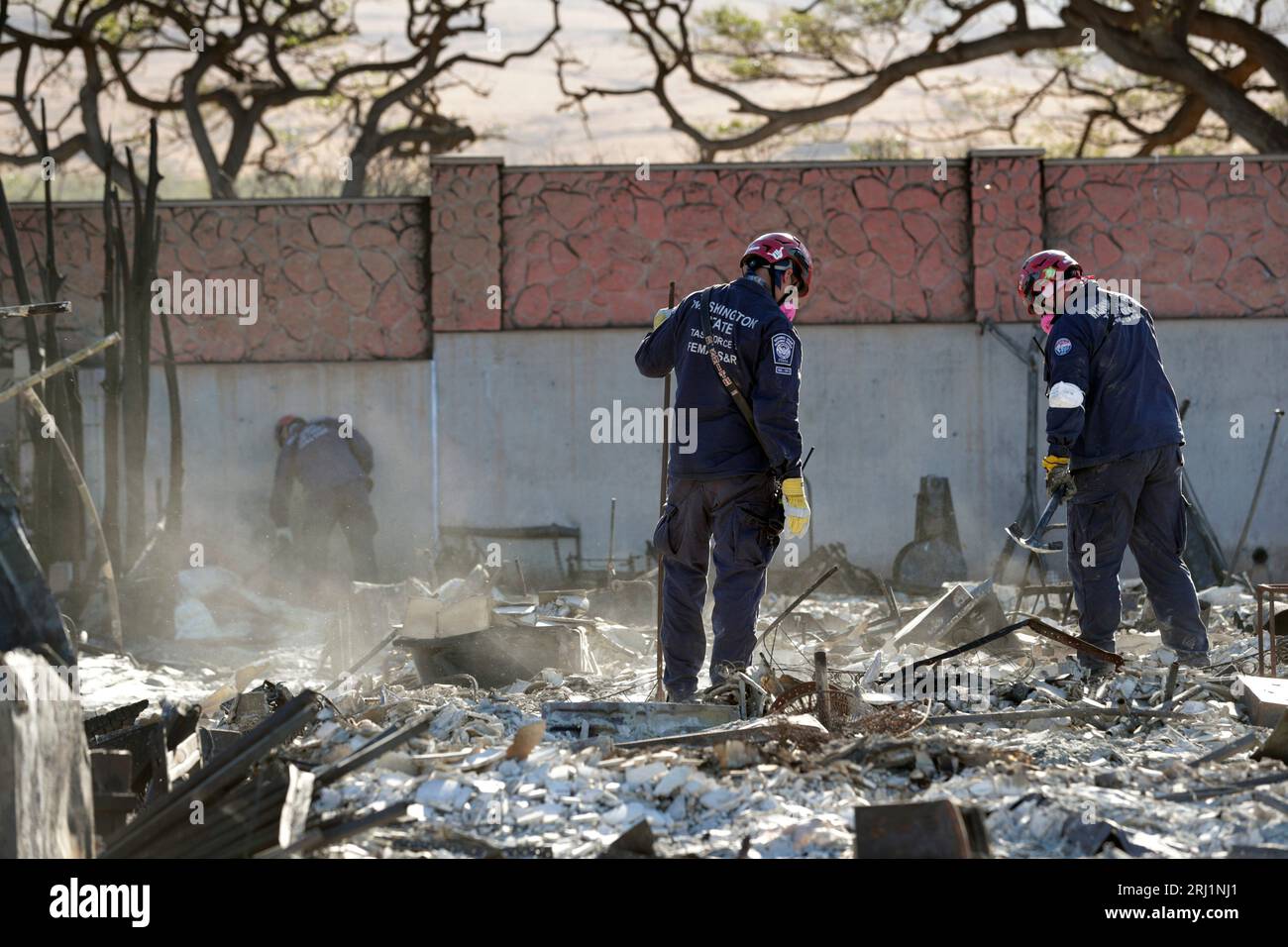 Lahaina, United States. 17 August, 2023. Urban Recovery teams comb ...
