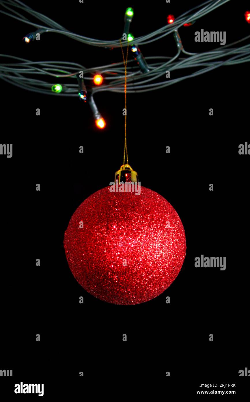 Red sphere and christmas lights Stock Photo - Alamy
