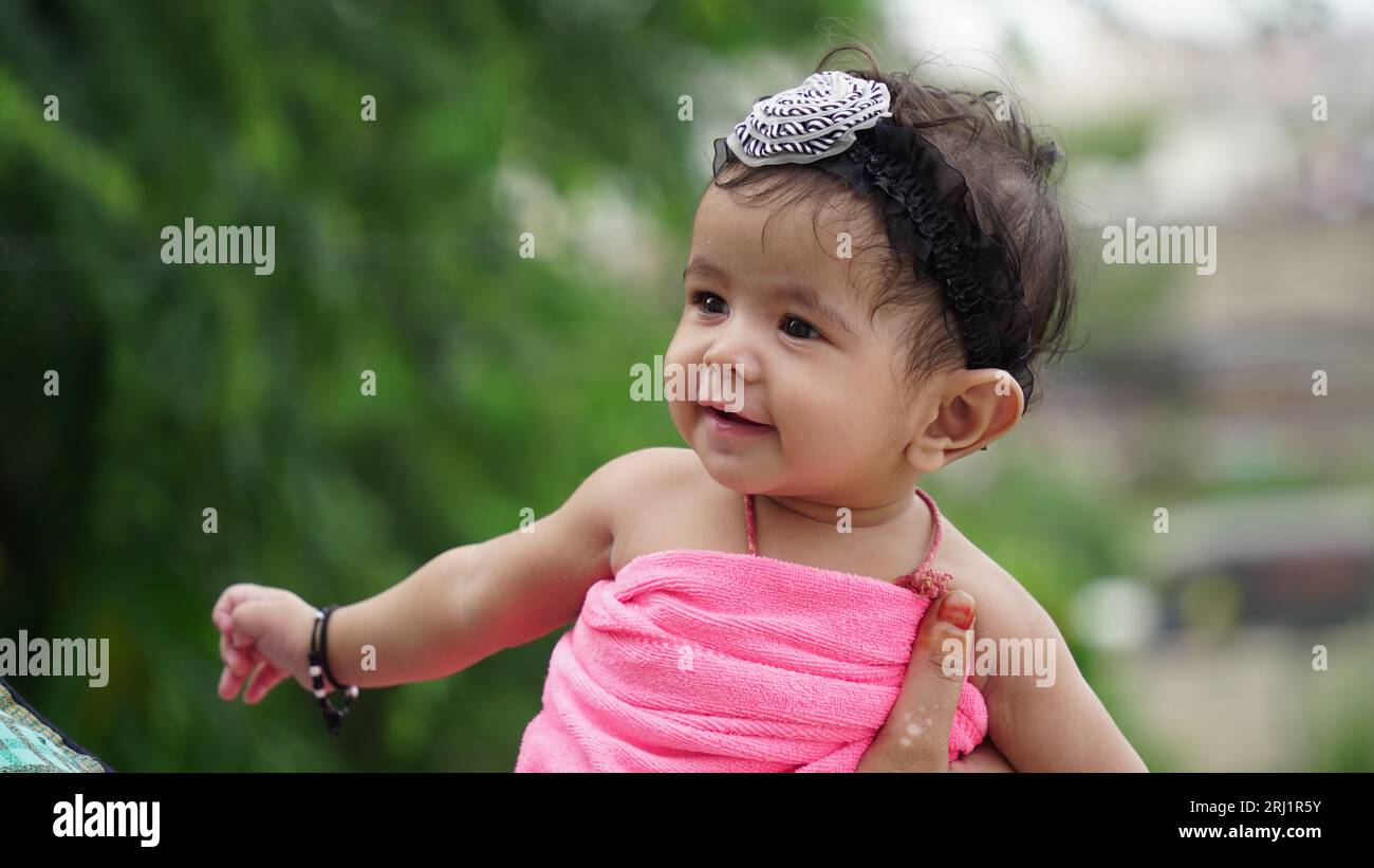 Portrait of a happy laughing child girl. Close-up portrait of her she ...