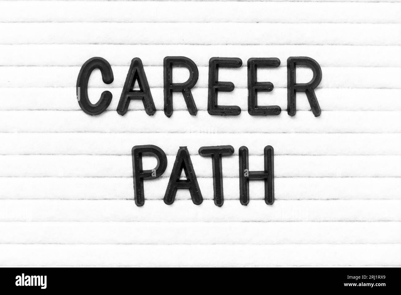 Black color letter in word career path on white felt board background ...