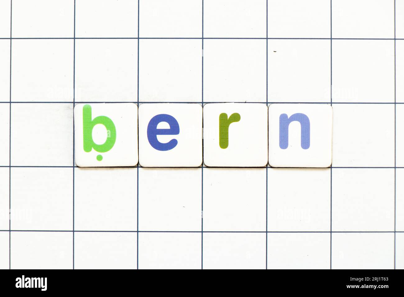 Colorful tile letter in word bern on white grid background Stock Photo ...