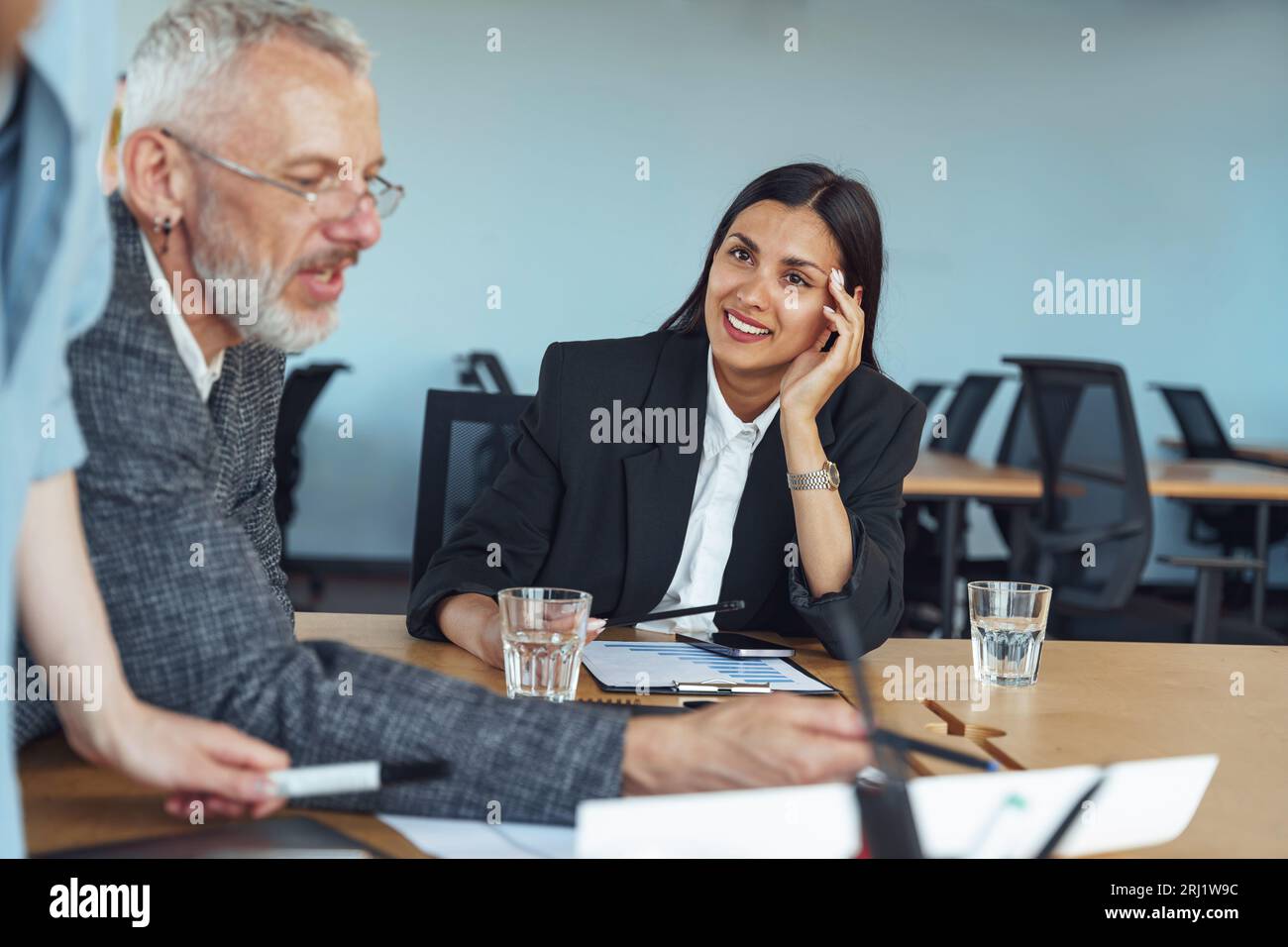 Group of people discussing documents project in the office. Business ...