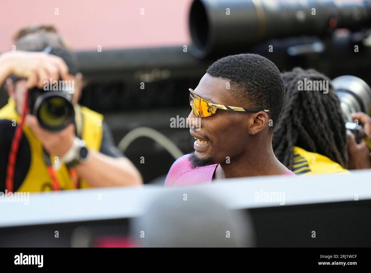 Fred Kerley, of the United States, leaves the stadium after finishing ...
