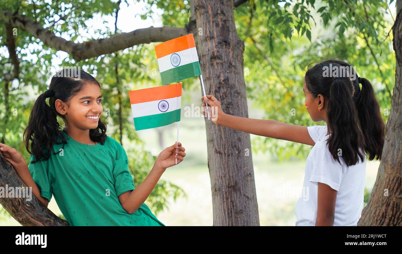 Happy Indian kids holding Indian National flag. Indian Kids celebrating ...