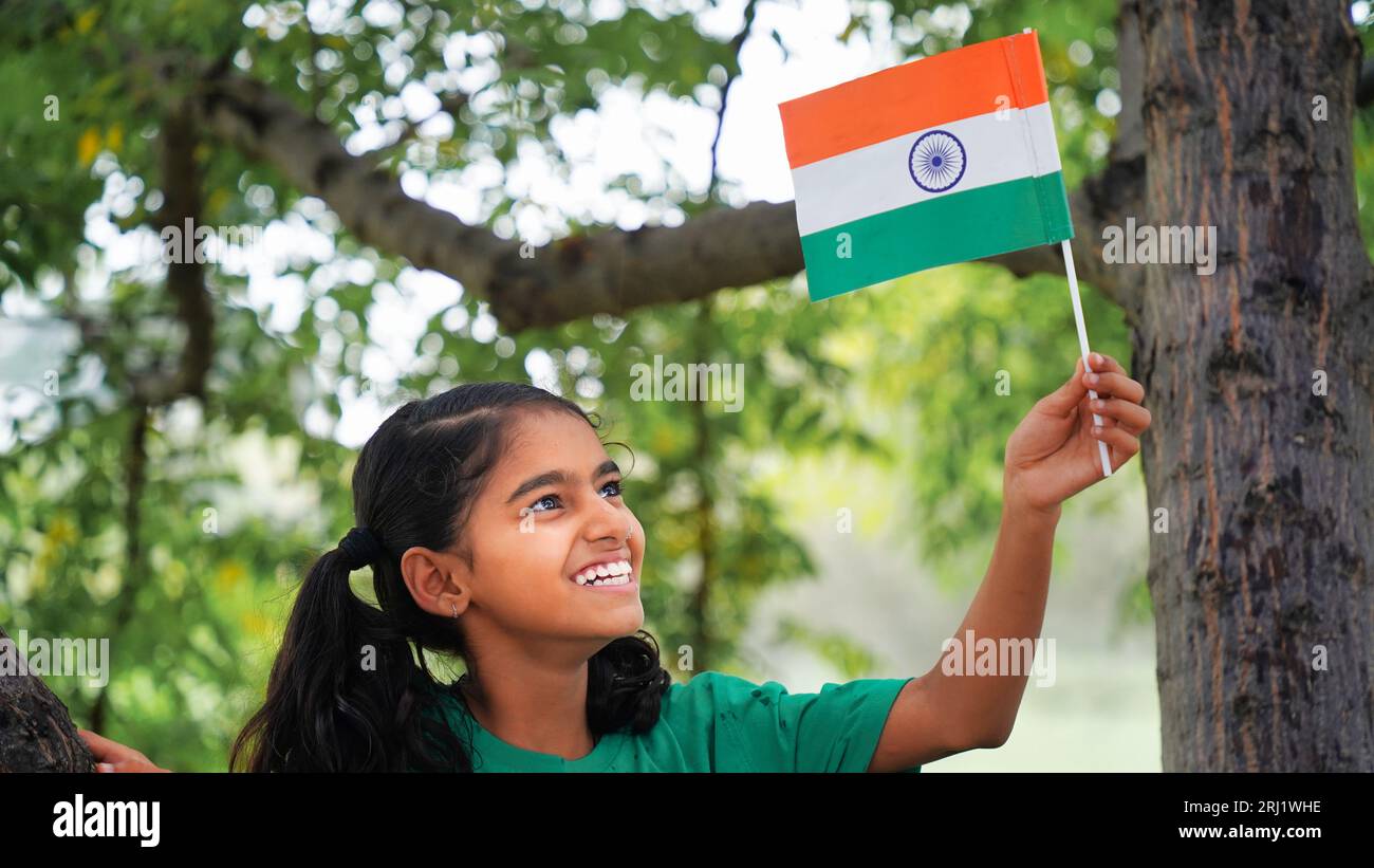 Happy Indian kids holding Indian National flag. Indian Kids celebrating ...