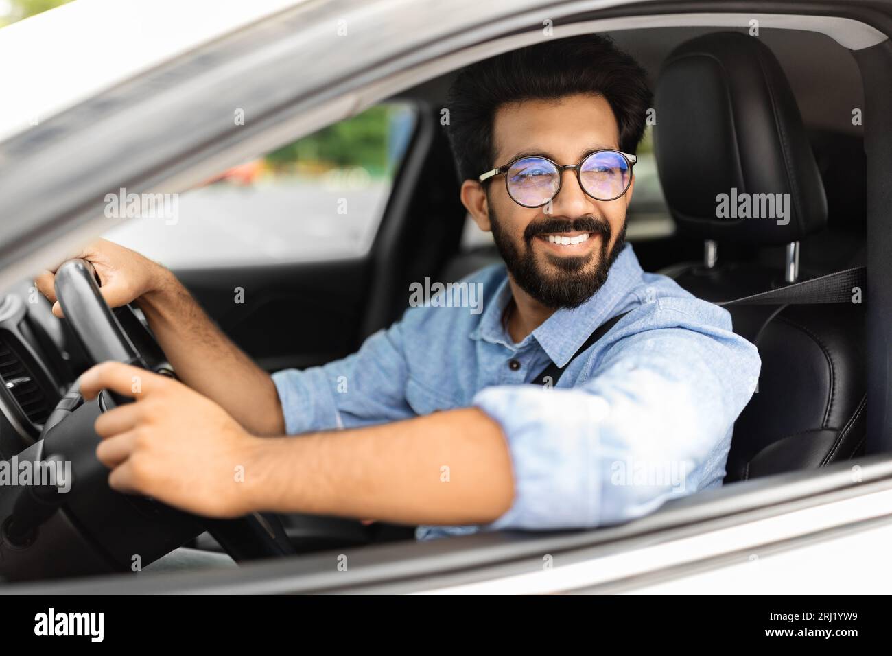 Indian Man Driving Car