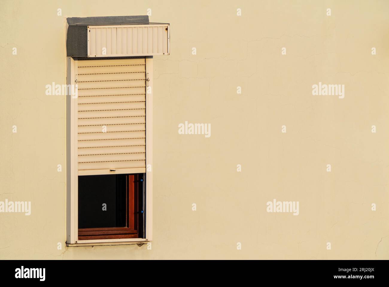 Blinds in an apartment. Semi-closed window Stock Photo - Alamy