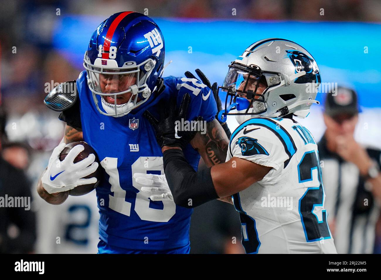 New York Giants wide receiver Isaiah Hodgins (18) is tackled by ...