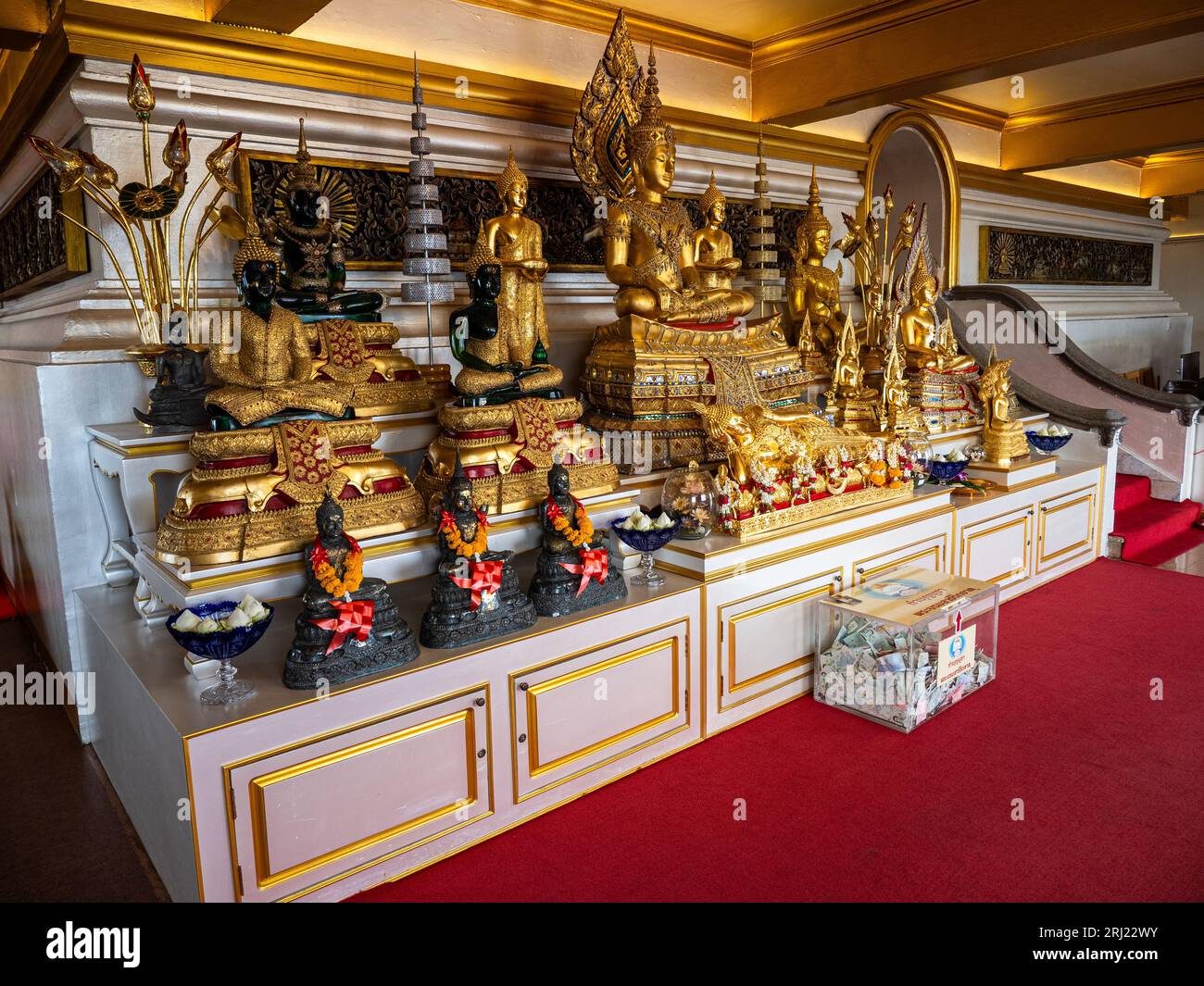 Arranged in a staggered formation on a base at Bangkok's Wat Saket, the ...