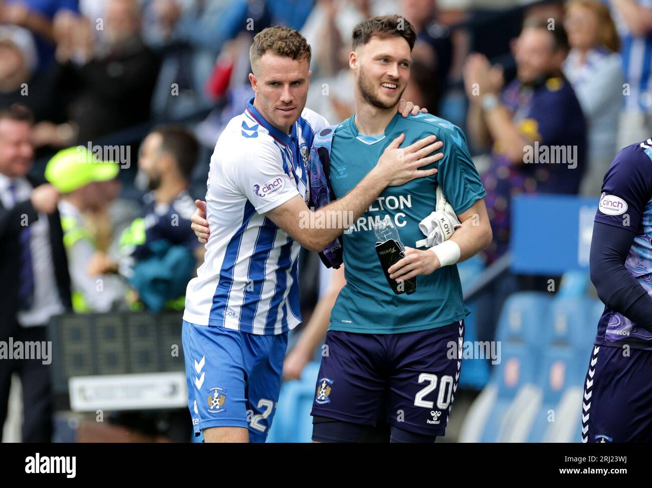 Kilmarnock's Marley Watkins (left) and goalkeeper Kieran O'Hara ...