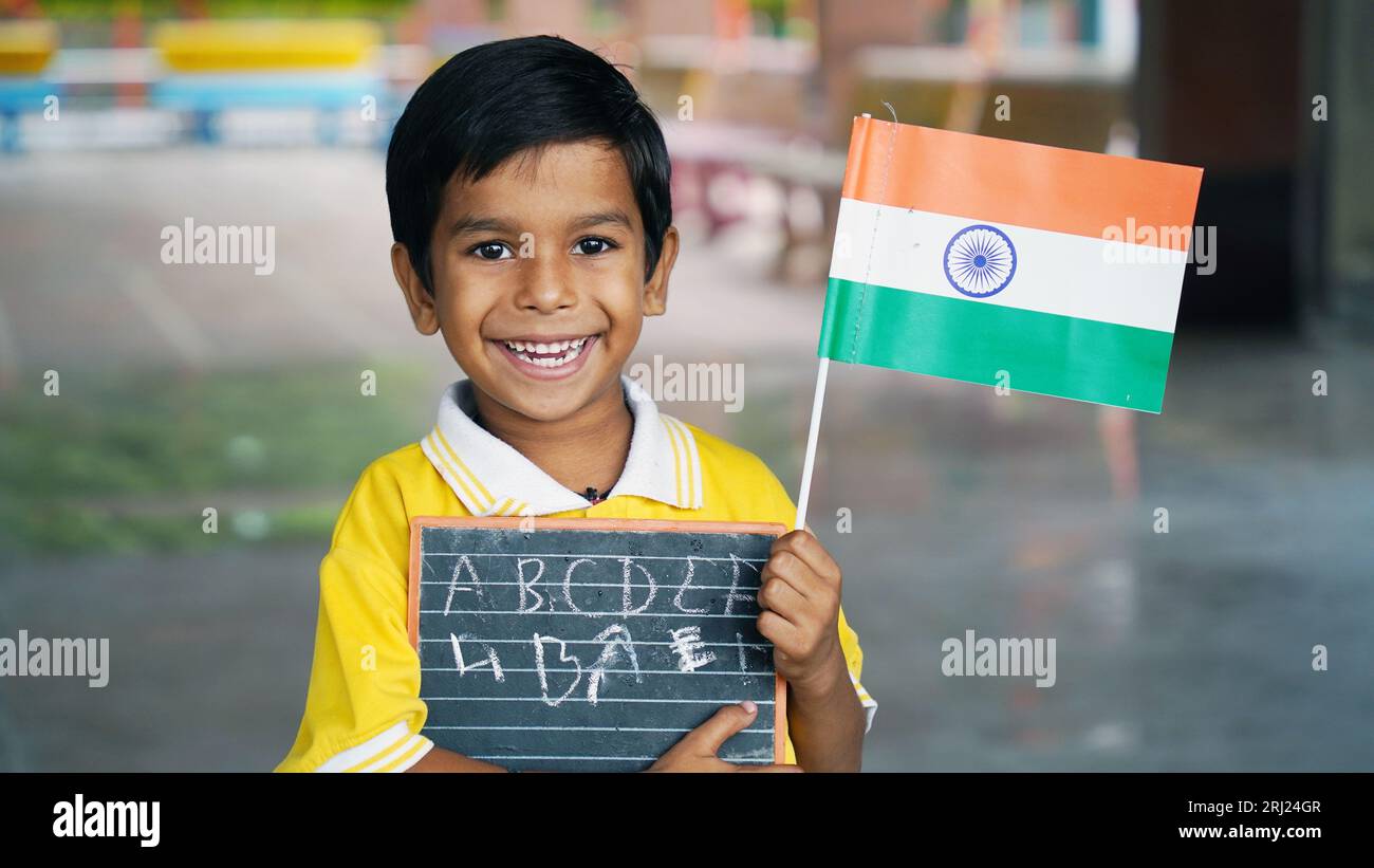 Cheerful indian holding indian national flag, happy independence day ...