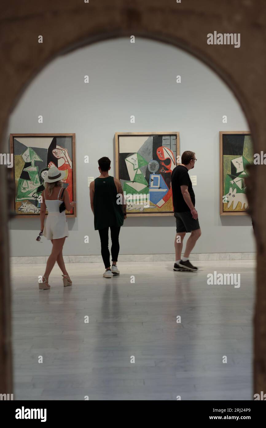 Art enthusiasts admiring various masterpieces by Pablo Picasso in ...