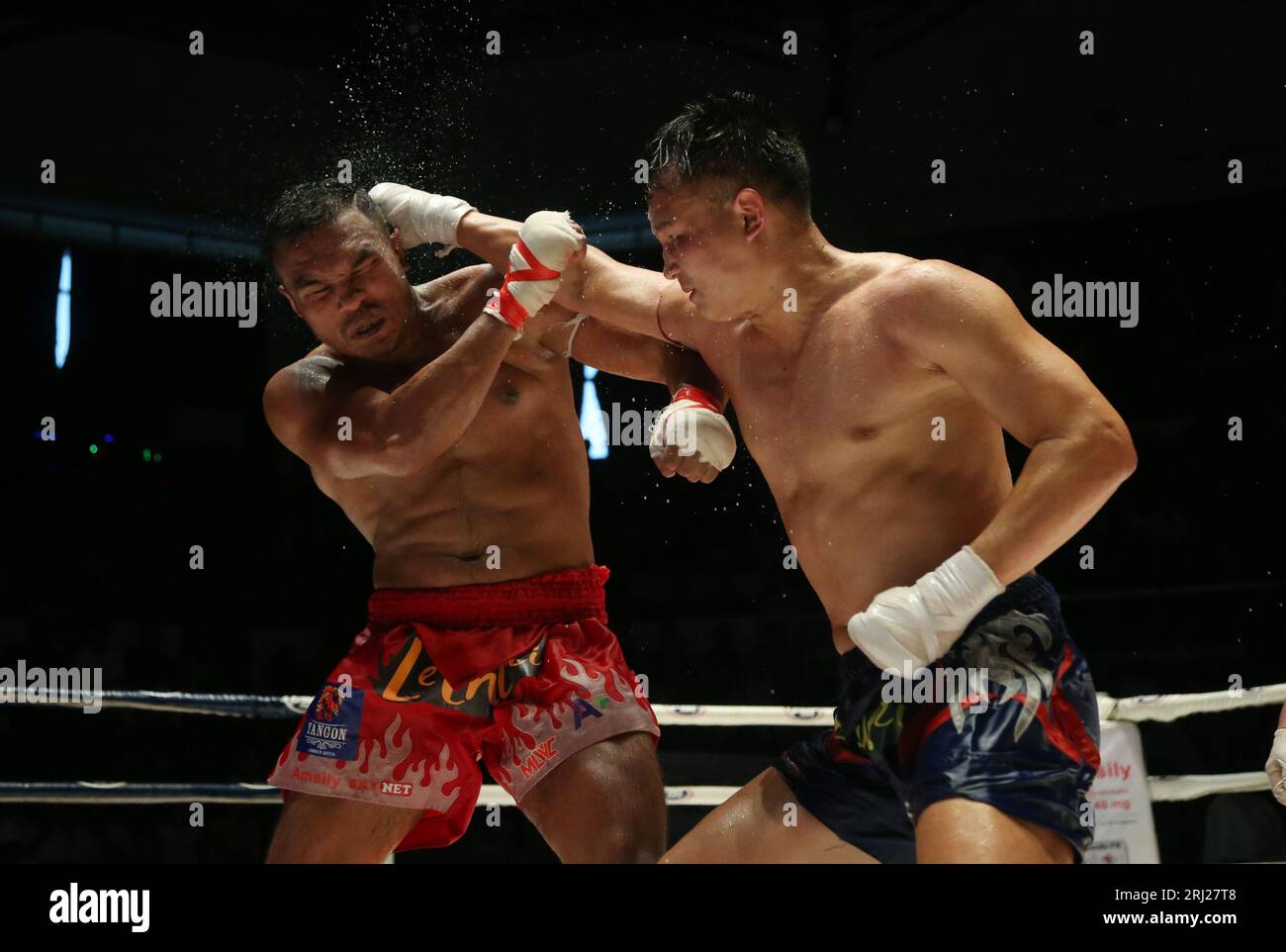 Yangon, Myanmar. 20th Aug, 2023. Tun Tun Min (L) of Myanmar fights with ...