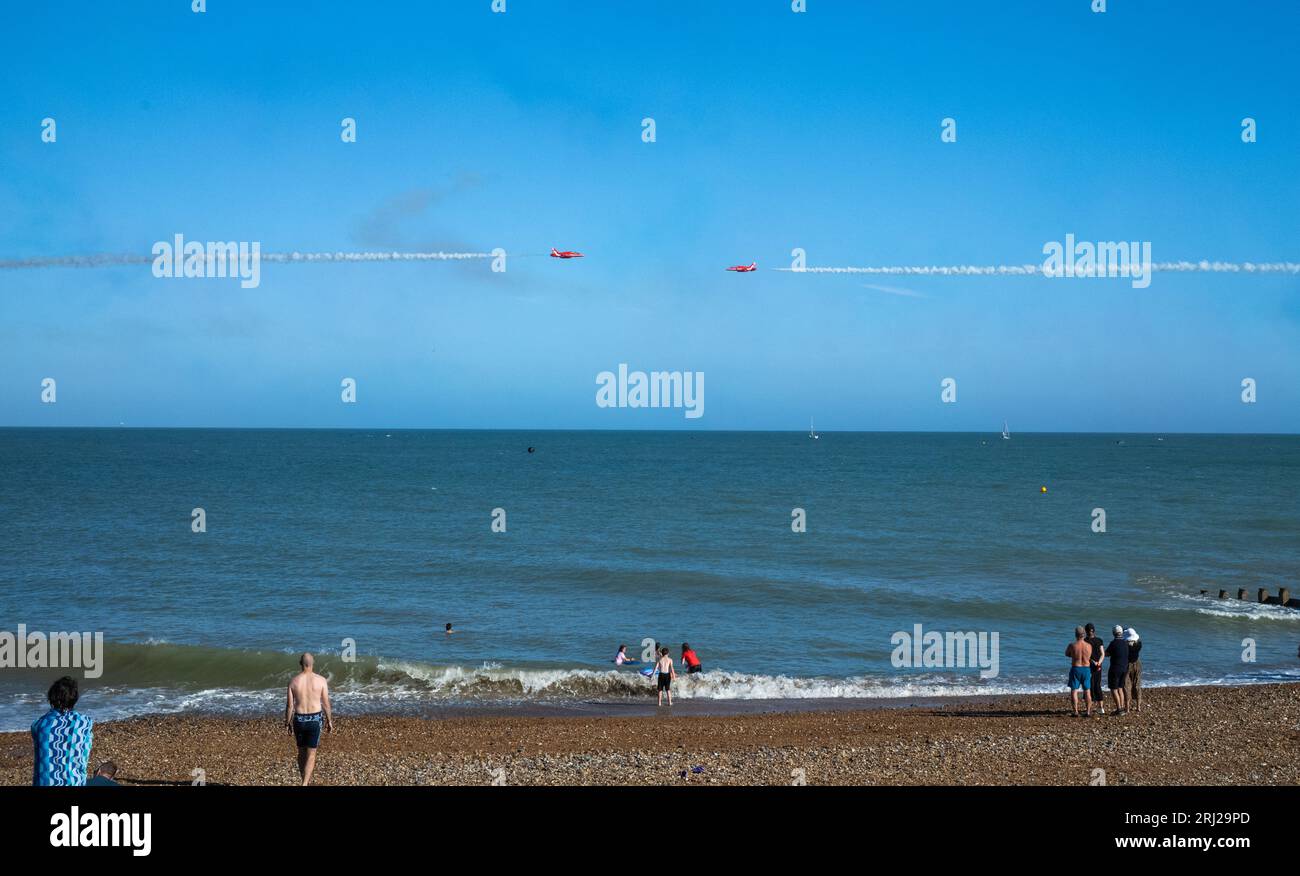 People swim in the sea as the world famous RAF display team The Red ...