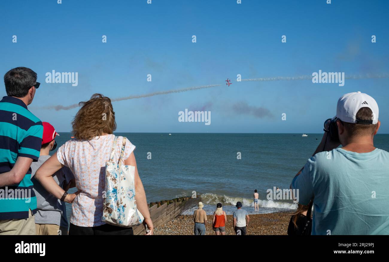 People watch a deliberate near miss from Eastbourne beach as the world ...