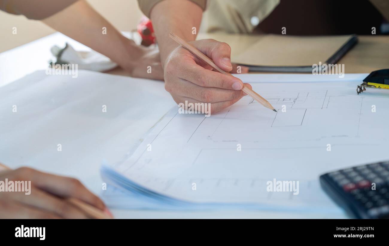 Group of engineer is discussion and brainstorming about condominium ...