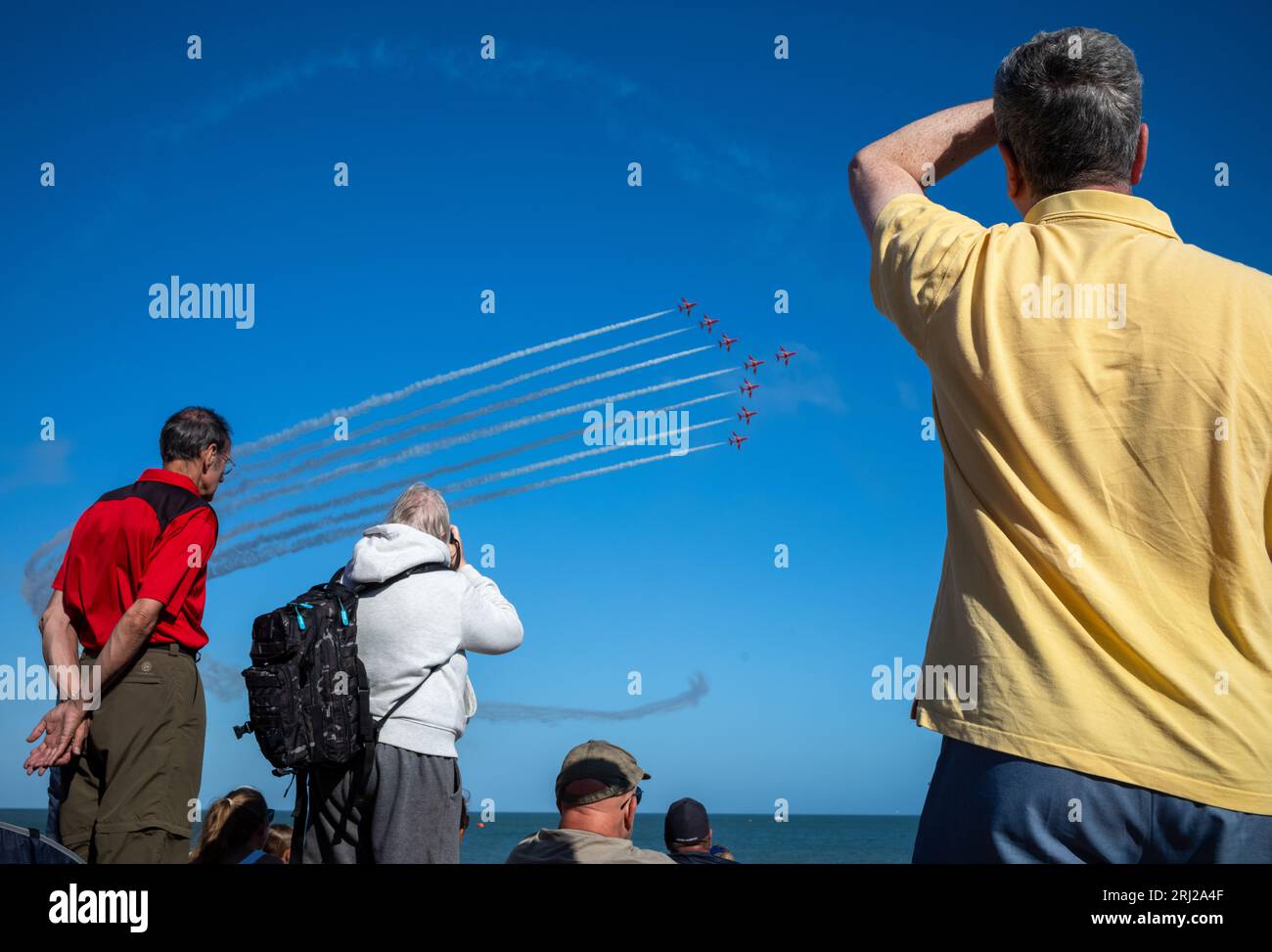 People on Eastbourne beach watch as the world famous RAF display team ...