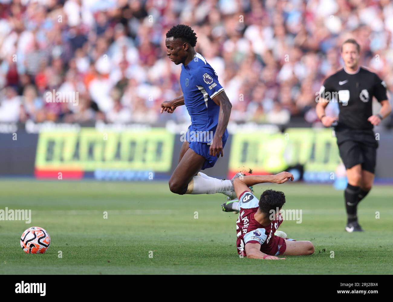 London, UK. 20th Aug, 2023. Nayef Aguerd of West Ham United fouls ...